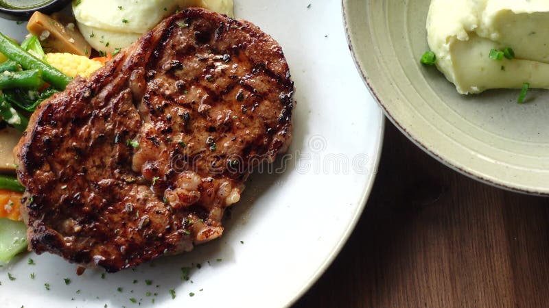 Beef Steaks Meat with Potato Mash on Table Stock Footage - Video of ...