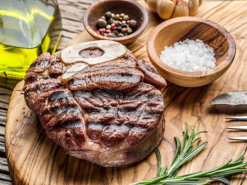 Beef Steaks with Spices on a Wooden Tray Stock Photo - Image of olive ...