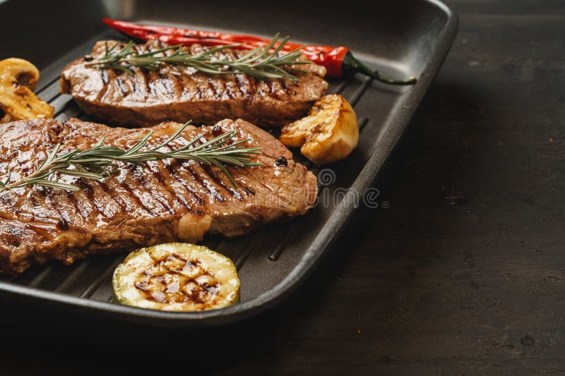 Beef Steaks with Vegetables on Grill Pan Stock Image - Image of ...
