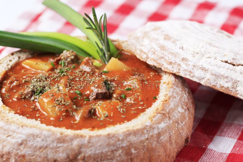 Beef stew in a bread bowl stock image. Image of european - 18438311