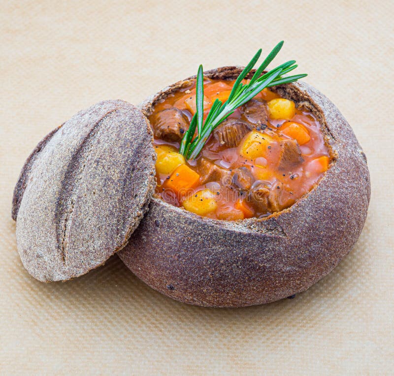 Beef stew in bread bowl stock photo. Image of gravy - 178438694