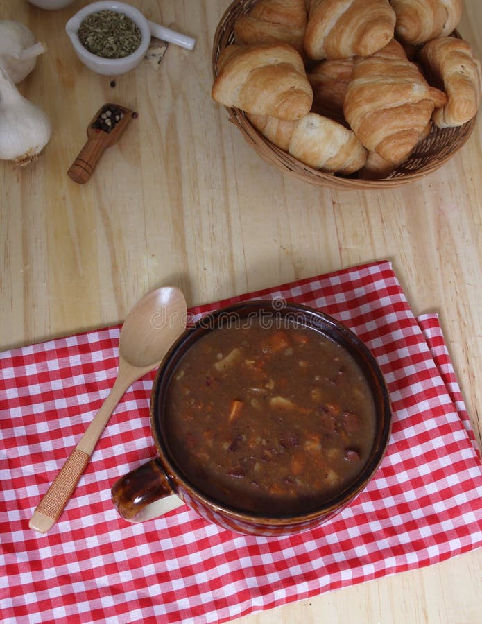 Beef Stew and Fresh Bread in Rustic Kitchen with Red and White ...