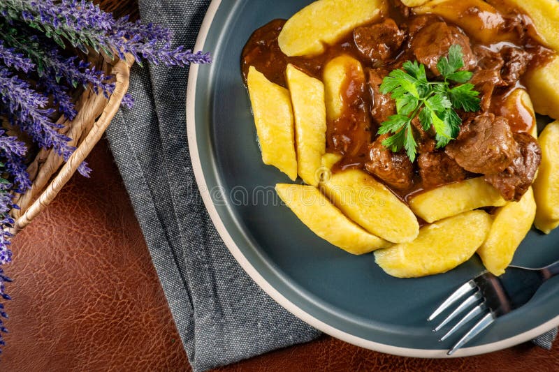 Beef Stew in Gravy Served with Potato Dumplings Stock Image - Image of ...