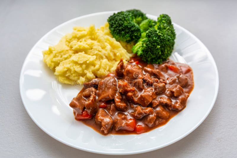 Beef Stew on a Plate with Boiled Potatoes and Green Broccoli Stock ...