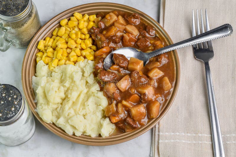 Beef Stew with Corn and Buttered Mash Potatoes Stock Image - Image of ...