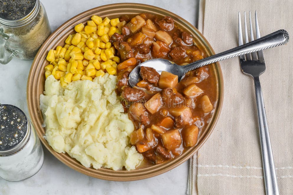 Beef Stew with Corn and Buttered Mash Potatoes Stock Image - Image of ...