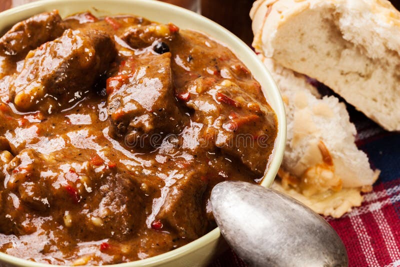 Beef Stew Served with Crusty Bread Stock Photo - Image of dish, gravy ...