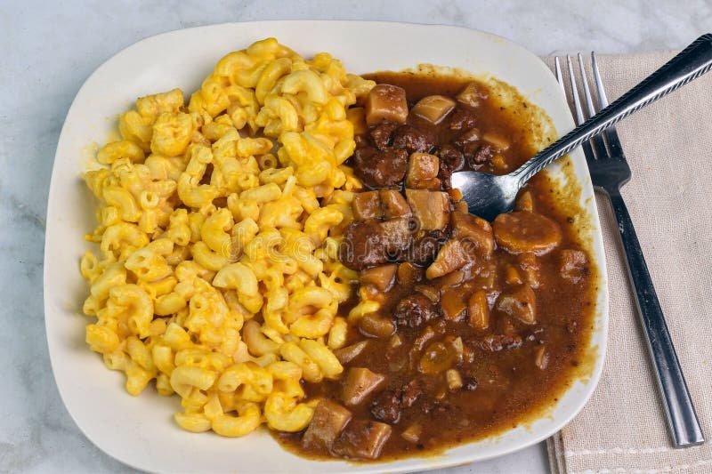 Beef Stew with Macaroni and Cheese Stock Photo - Image of fish, curry ...