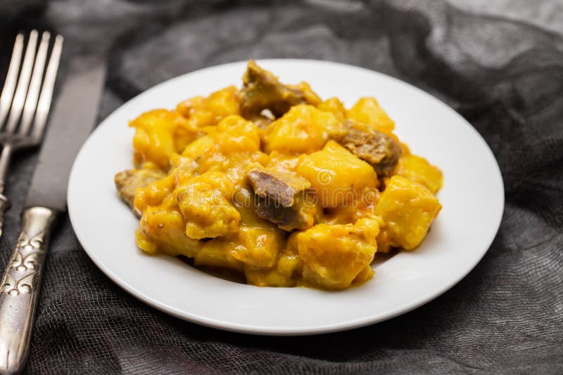 Beef Stew with Sweet Potato and Curry Sauce on Plate Stock Image ...