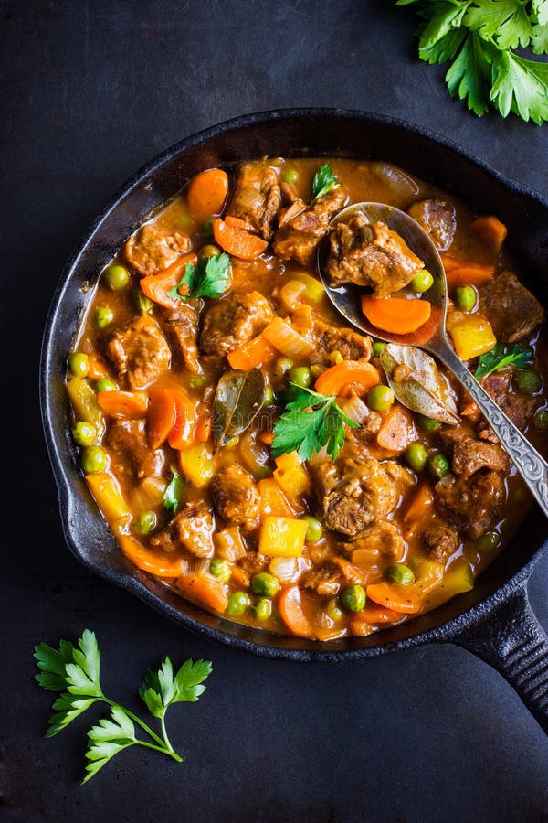 Beef Stew with Vegetables on Dark Background Stock Photo - Image of ...