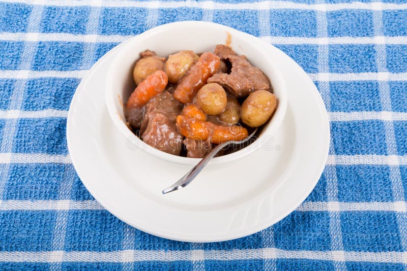 Beef Stew in White Bowl on Blue Towel Stock Image - Image of casserole ...