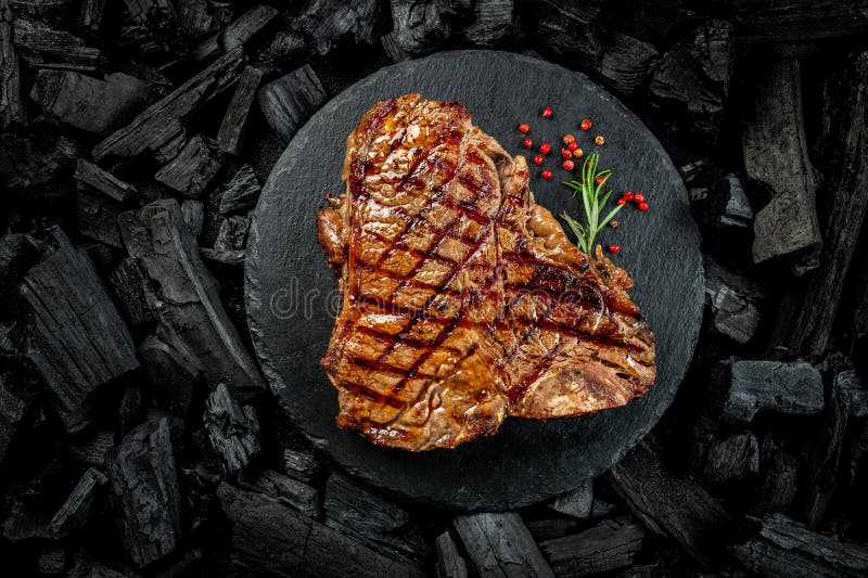 Beef T-bone Steaks on BBQ Grill Coal. Porterhouse Steak or T Bone Steak ... Beef T-bone Steaks on BBQ Grill Coal. Porterhouse Steak or T Bone Steak ...