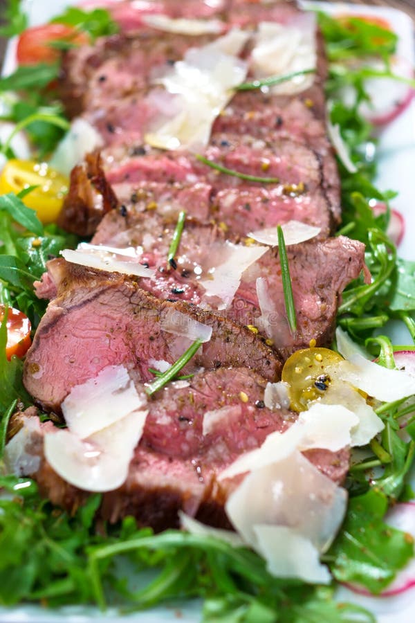 Beef Tagliata with Arugula stock photo. Image of italia - 64936982