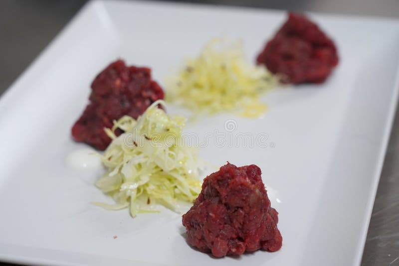 Beef Tar-tar. Meat Tar Tar on a White Plate, on a White Background ...