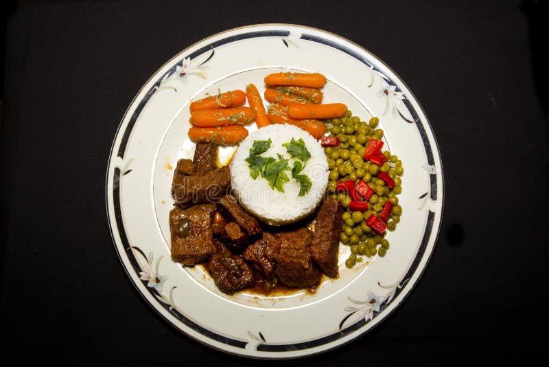Beef tips and rice stock photo. Image of steak, dinner - 95526112