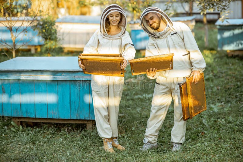 Beekeepers on the apiary stock image. Image of uniform - 163567683