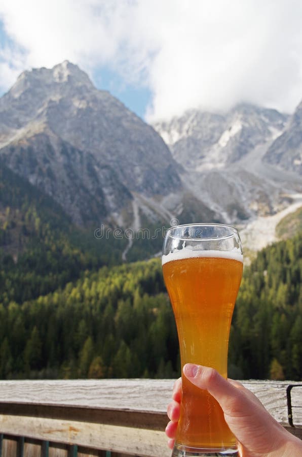 Beer in Alpine scenery stock image. Image of healthy - 45424705
