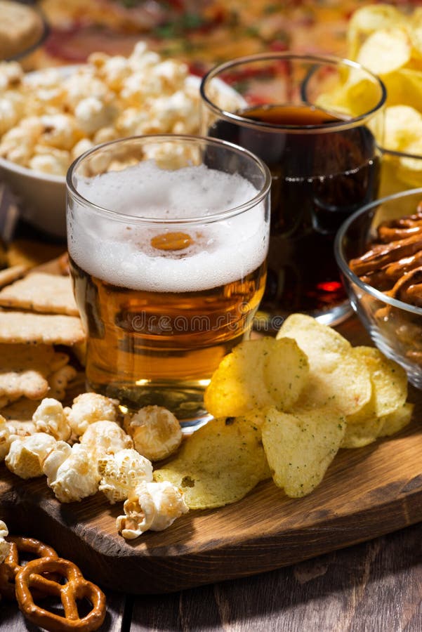 Beer and an Assortment of Snacks, Vertical Top View Stock Image - Image ...