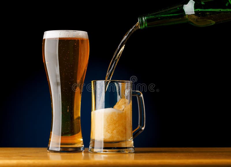 Beer on the Bar: Refreshing Brew on a Table Stock Photo - Image of ...