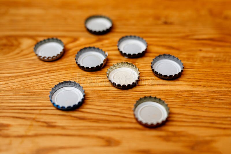 Beer Bottle Caps on a Wooden Table Stock Photo - Image of foam, open ...