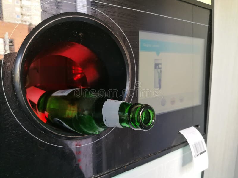 Beer Bottle Inserted in the Automatic Reverse Vending Machine for ...