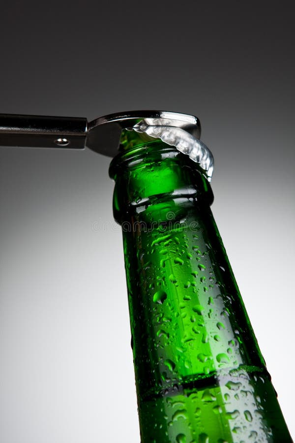 Beer bottle opening stock image. Image of alcohol, cold - 8965573