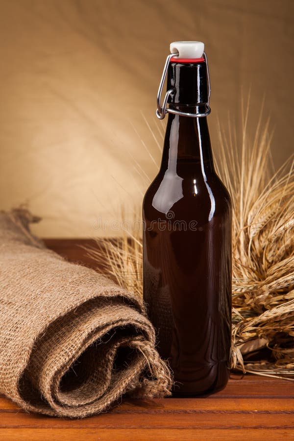 Beer Bottle and Spikes of Barley Stock Image - Image of bubbles, close ...