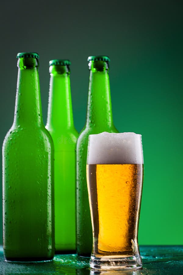 Beer Bottles with Full Glass Stock Photo - Image of industry, drink ...