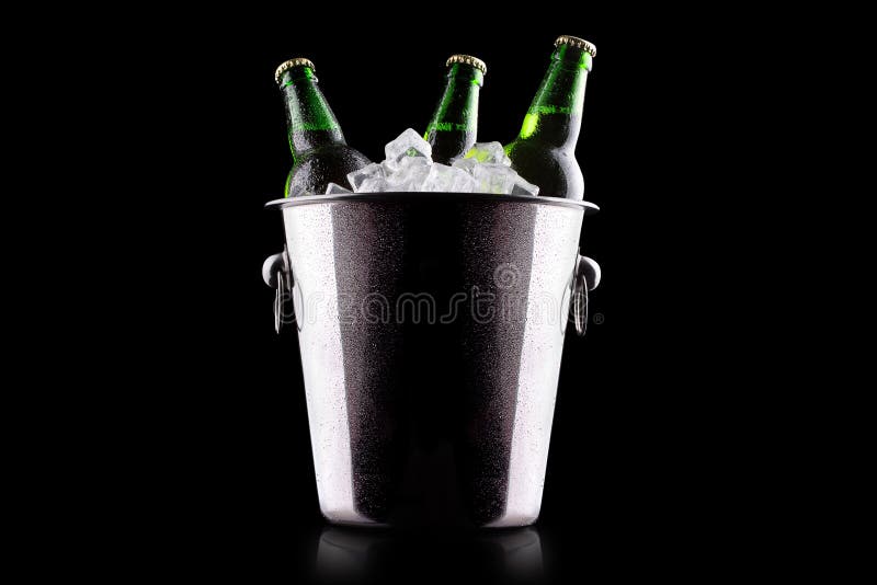 Beer bottles in ice bucket stock image. Image of drink - 37436285