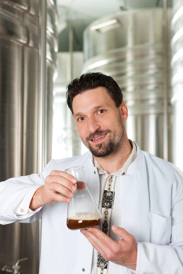 Beer Brewer in His Brewery Examining Stock Photo - Image of kettle ...