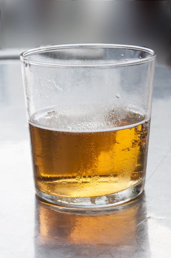 Beer cane stock photo. Image of liquid, droplet, glass - 188653466