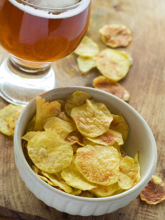 Beer and chips stock photo. Image of yellow, bubble, vertical - 15198460