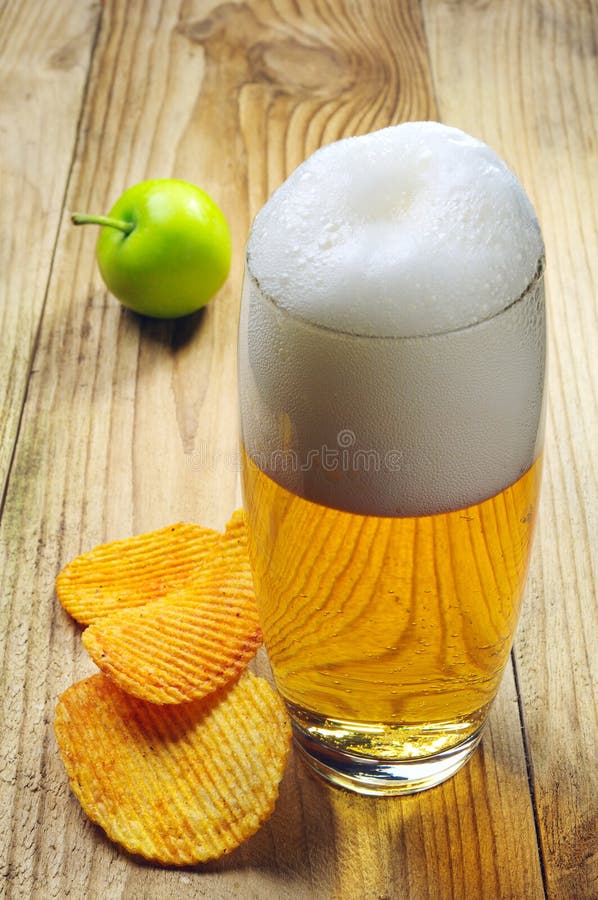 Beer and chips stock image. Image of eating, fresh, food - 25747887