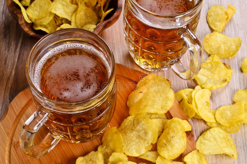 Beer and chips stock photo. Image of golden, friday, bubble - 54000532