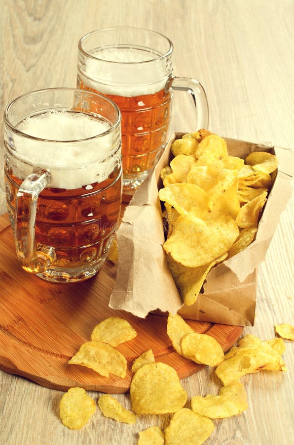 Beer and chips stock image. Image of lunch, glass, fast - 54060335