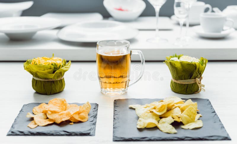Beer and Chips on the Large White Table Stock Image - Image of dish ...