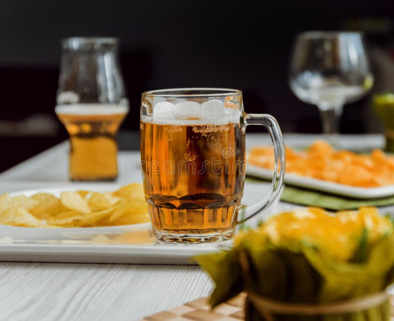 Beer and Chips on the Large White Table Stock Image - Image of culture ...