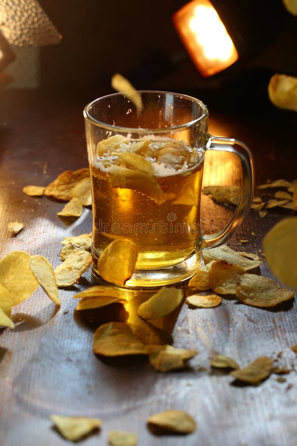 Beer with Chips on a Wooden Background Stock Photo - Image of eating ...