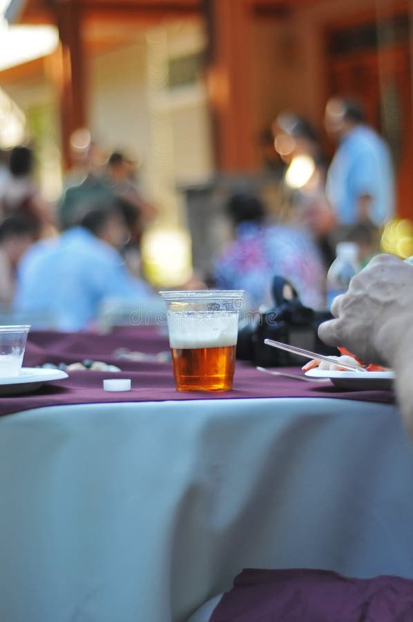 Beer Cup on Table at a Party Stock Photo - Image of cool, cold: 15162512
