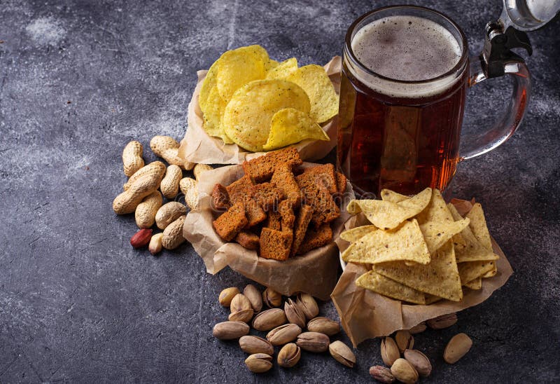 Beer and different snacks stock image. Image of background - 89761783