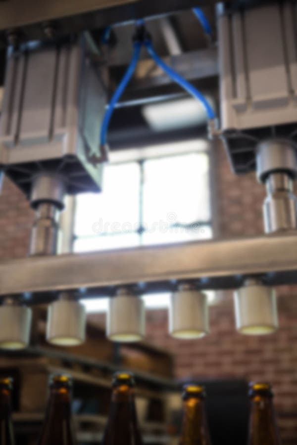 Beer filling machine stock image. Image of food, bottle - 255573013