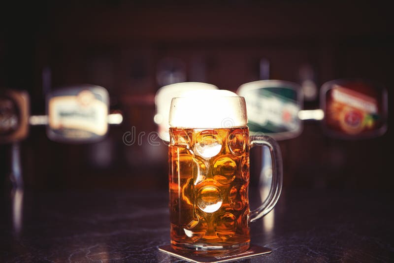 Beer Glass on a Bar Table. Closeup Stock Image - Image of white, lager ...