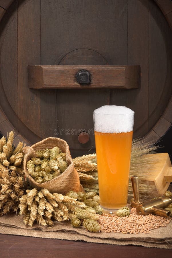 Beer glass with barrel stock photo. Image of weissbier - 65293278
