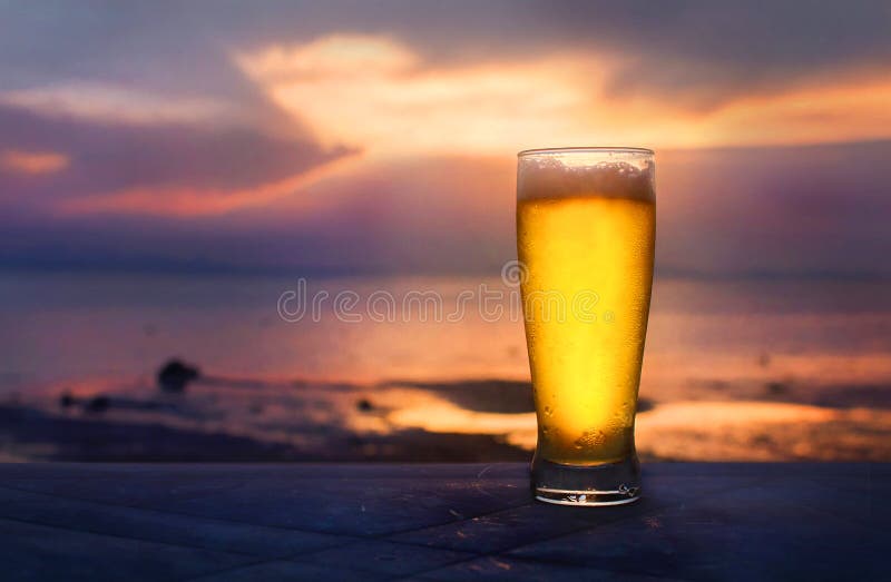 Beer in the sunset stock image. Image of sand, glass - 12041869