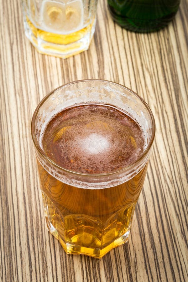 Beer in the glass stock image. Image of copyspace, froth - 79195939
