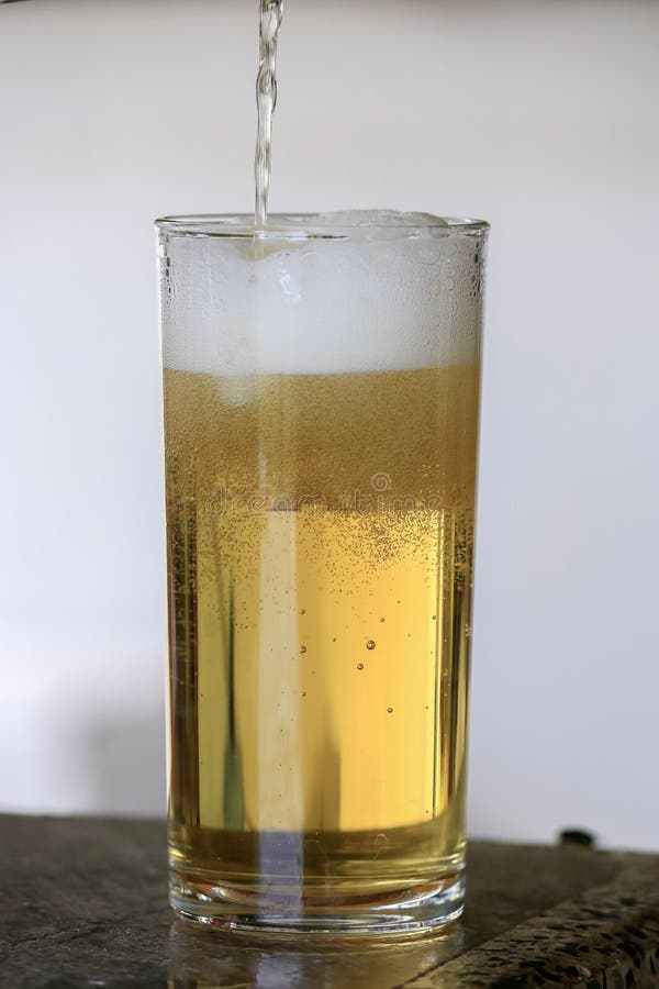 Beer in the Glass and Full of Beer Foam Stock Image - Image of event ...