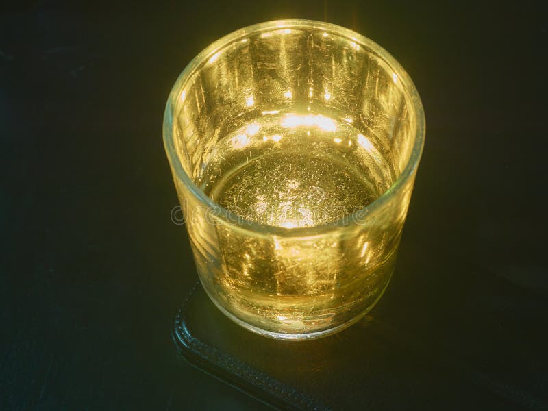 Beer Glass with Many Bubbles Lit Stock Image - Image of bulb, lamp ...