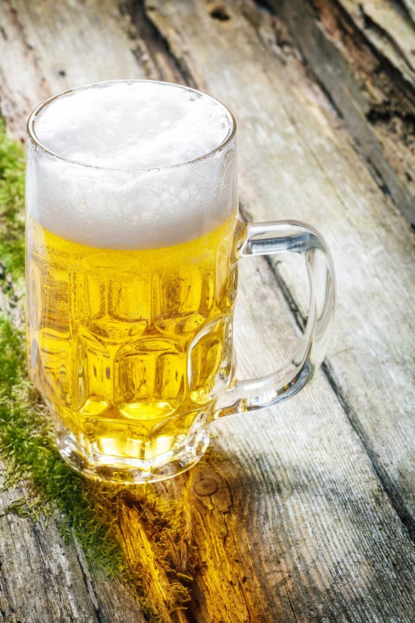 Beer in glass stock image. Image of glass, moss, board - 45923607