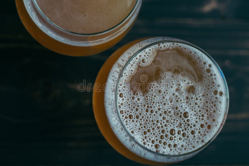 Beer glasses top view stock photo. Image of brewed, light - 98209304