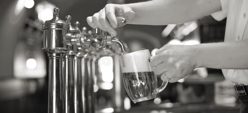 Beer in the hand stock image. Image of barman, hand, glass - 83660139